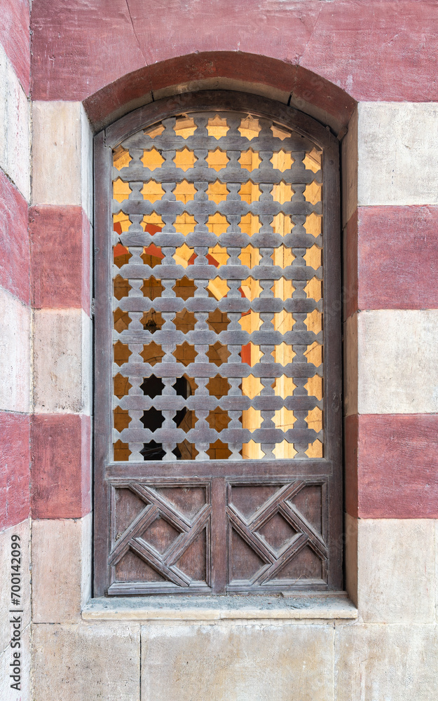Rustic charm of Mamluk architecture weathered wooden window with a ...