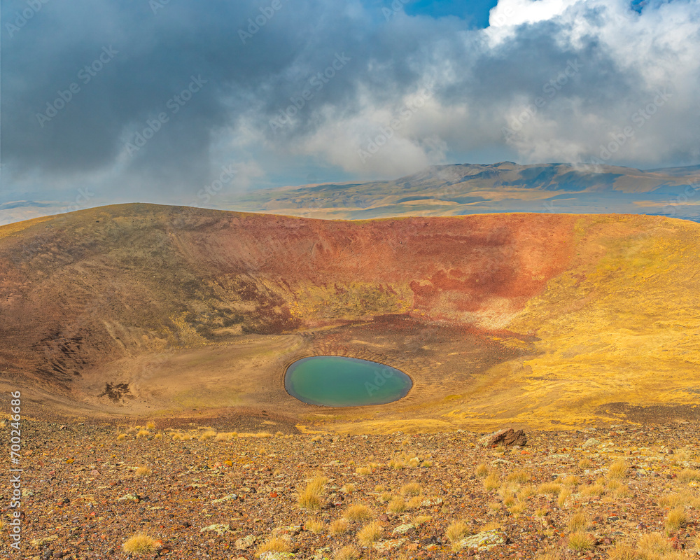 A top panorama view of the volcanic lake next to Azhdahak volcano in ...