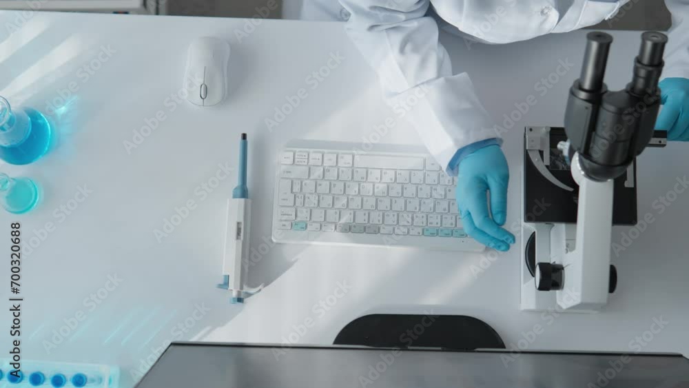 View from above. A true research scientist in a laboratory that is the ...