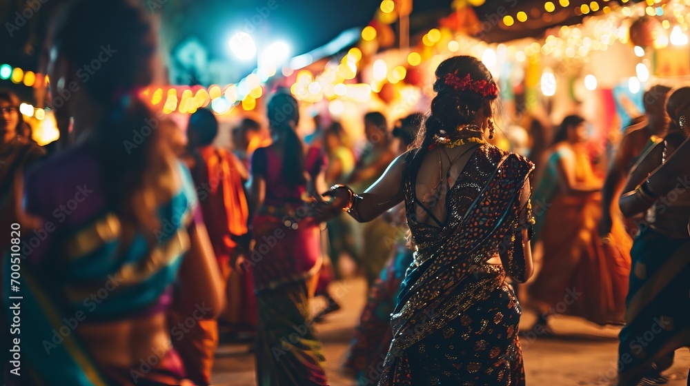 Elegant Woman in Traditional Attire Dancing Amidst a Colorful Nighttime ...