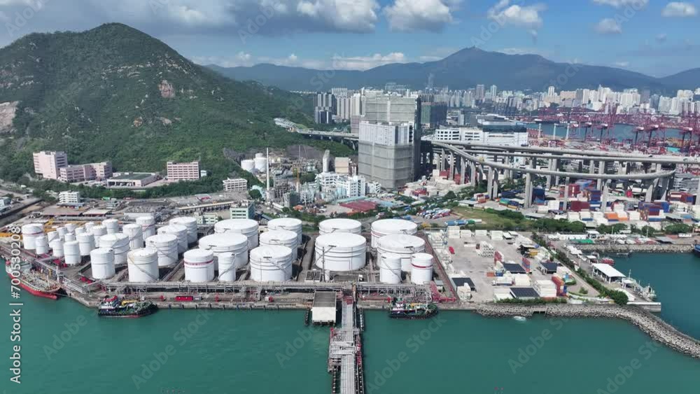 Drone Aerial Skyview in tank farm oil and gas terminal with lots of ...