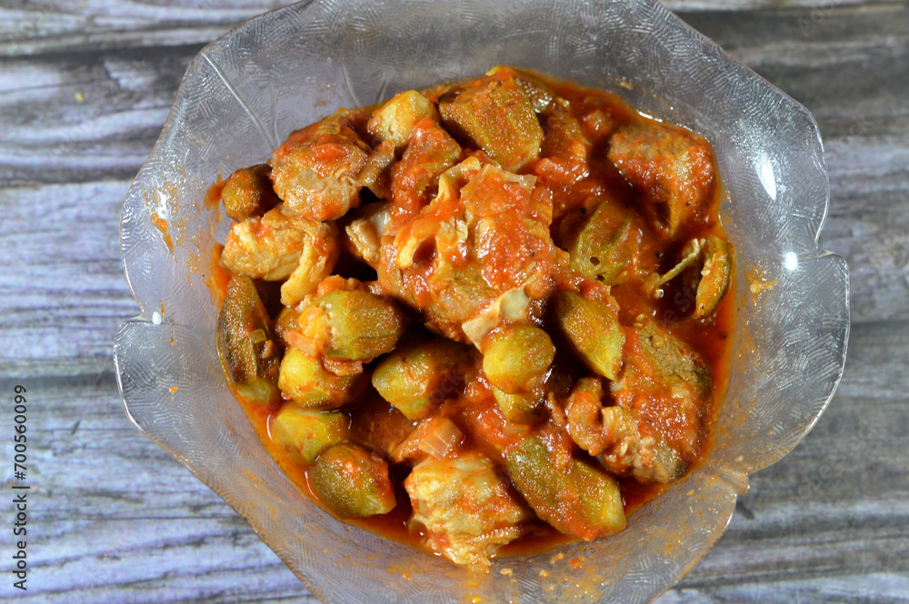 Okra cooked with beef meat pieces and tomato sauce, Bamia, bamya or ...