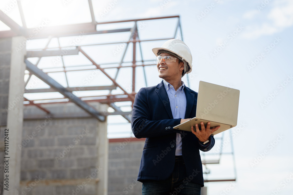 Portrait of cvil engineer with safety uniform working at construction ...
