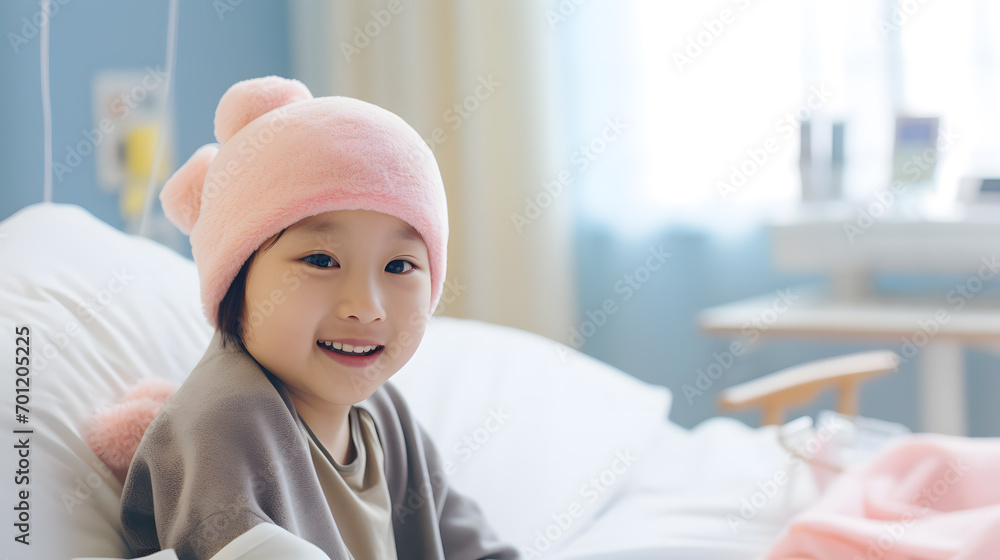 Photograph of a Japanese girl on a hospital bed, cancer patient sitting ...