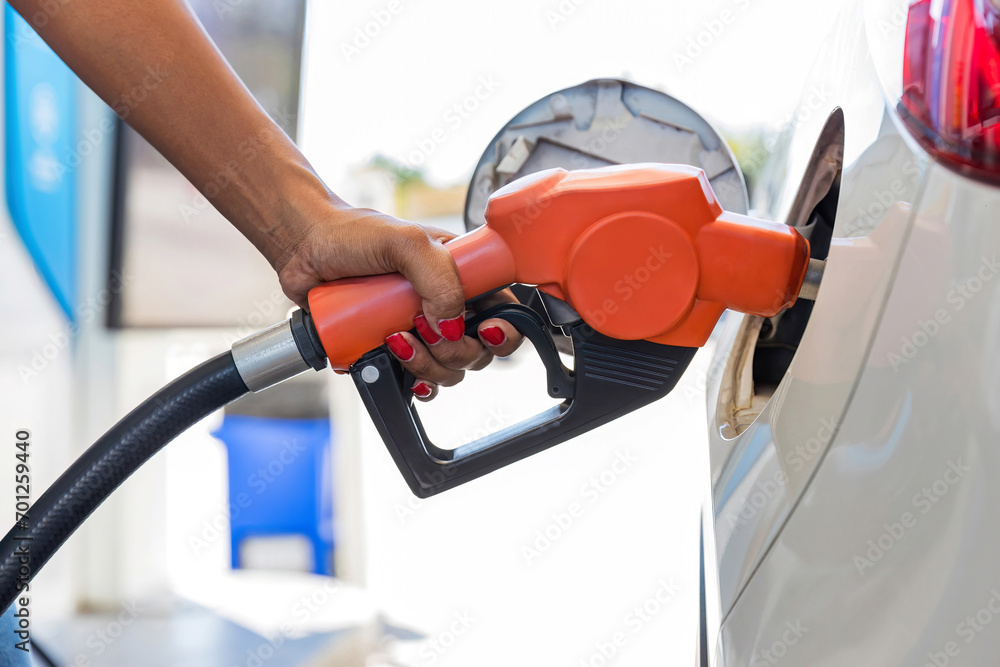 Man Refill and filling Oil Gas Fuel at station. Gas station - refueling ...