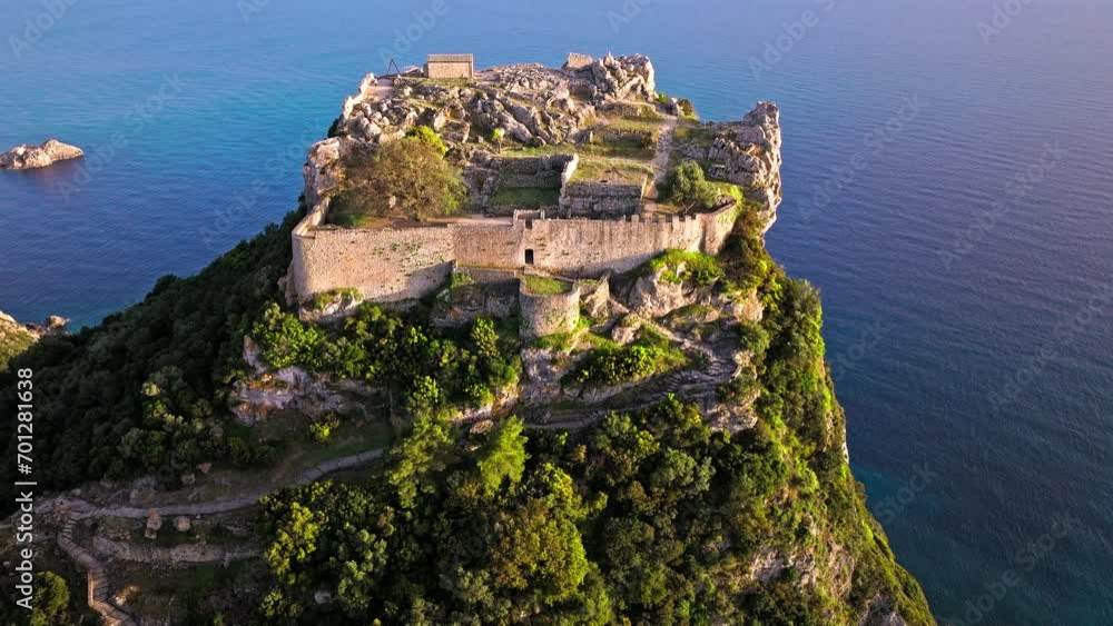 Angelokastro ancient Castle at the top of a steep hill with art and ...