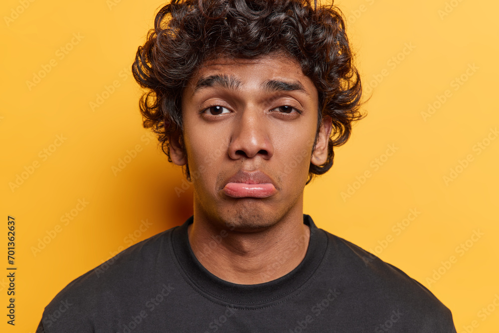 People negative emotions concept. Studio shot of Hindu male student ...