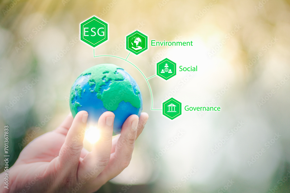 ESG. environment social governance investment business concept. Businessmen use a computer to ...