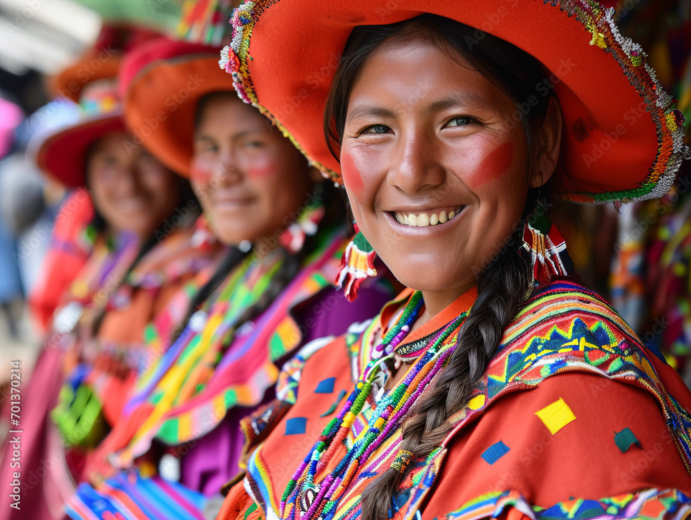 Smiling native indigenous people of Peru dressed in colorful native ...