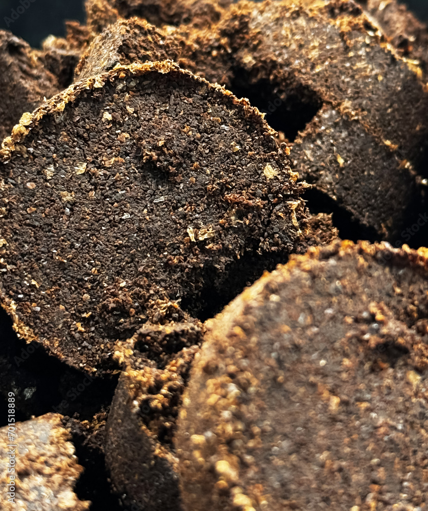 Coffee waste in round tablets after the coffee machine. Shallow depth ...