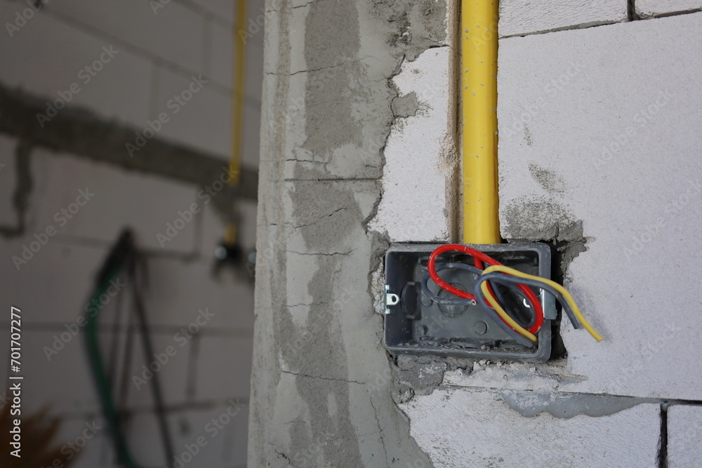 Holes in the wall for sockets with wires. Installation of sockets on ...