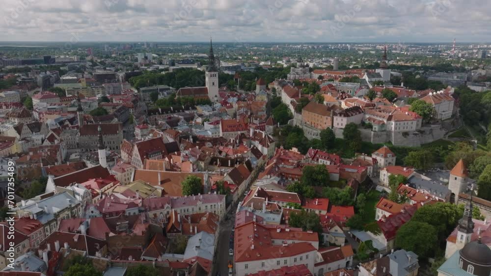 Vidéo Stock Backwards fly above historic city center. Old houses and ...
