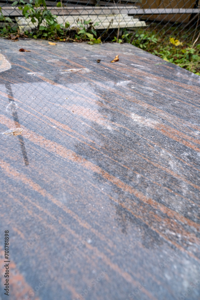 polished granite slab. Hallandia granite from Sweden. Brown stone with ...