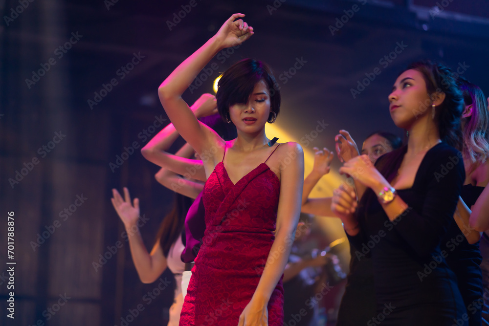 Sexy young woman people dancing and holding champagne glass in night ...