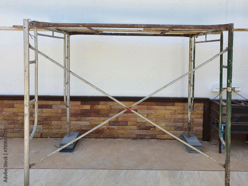 construction scaffolding is a scaffolding structure made of wood or ...