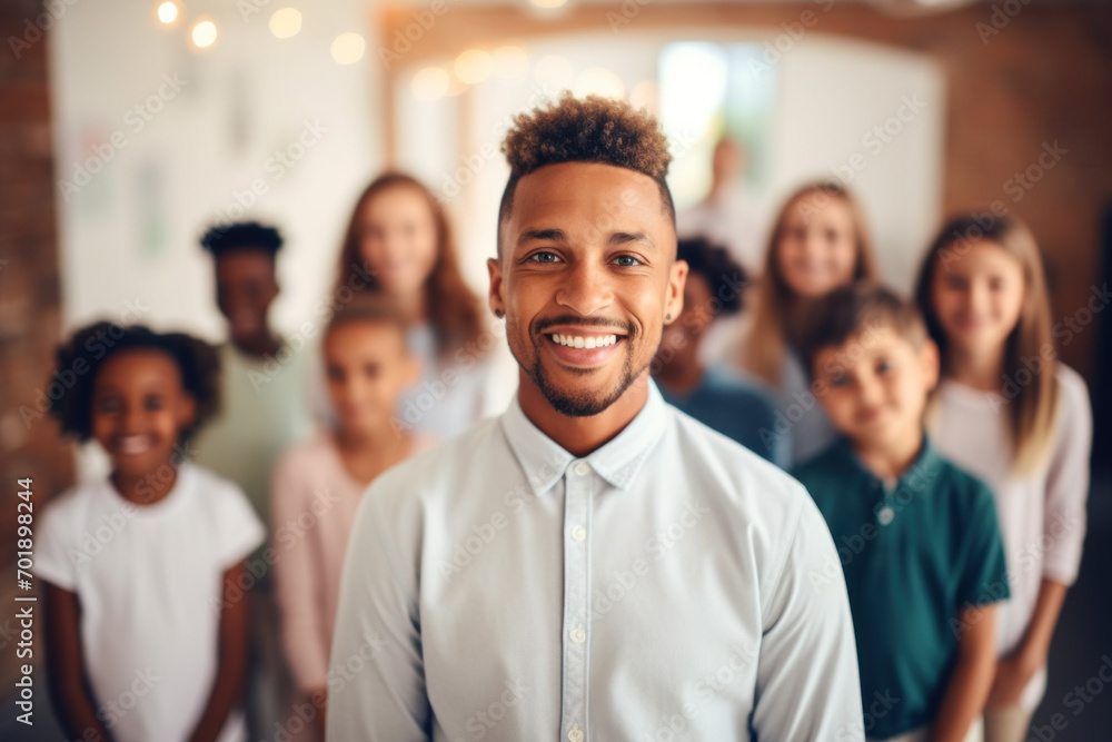 Smiling teacher with diverse students. Concept: inclusive education and ...