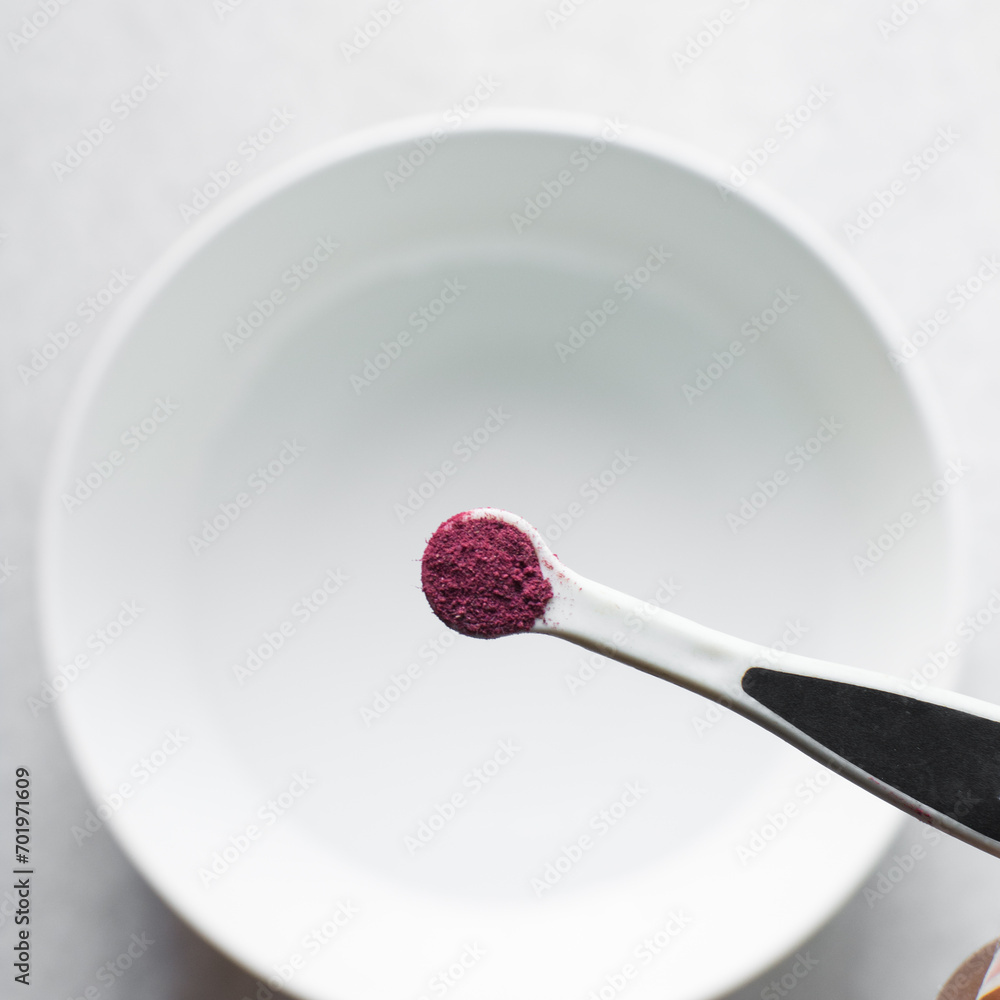 Beet powder in a measuring spoon, freeze dried beet powder in a spoon ...