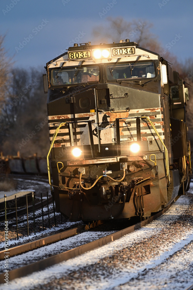 A Norfolk Southern Railway run-through locomotive reflects the last ...