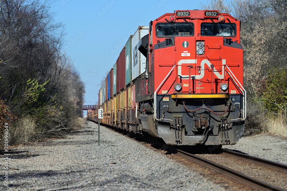A single locomotive serves as a rear-train distributed power unit on a ...