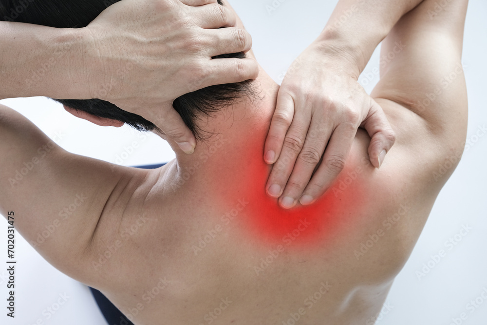Man has neck and shoulder pain He squeezed and massaged the pain in the ...
