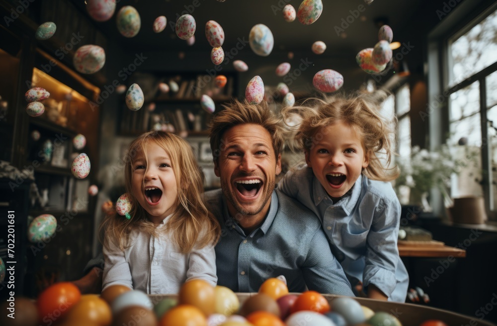 Family Fun with Easter Eggs. A family enjoying an Easter egg game, with ...