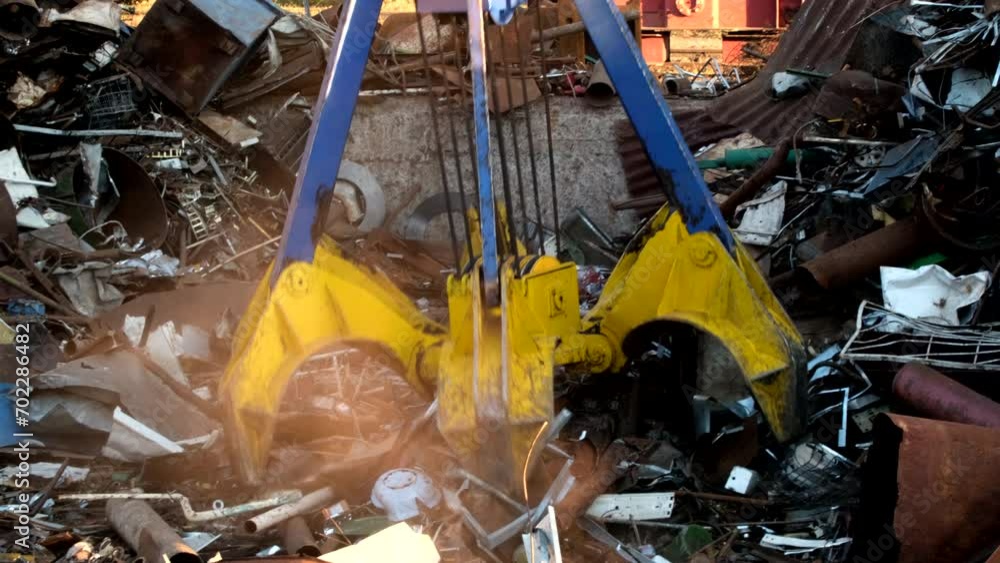 Metal scrap being loaded into a ship for recycling. Recycling metal ...