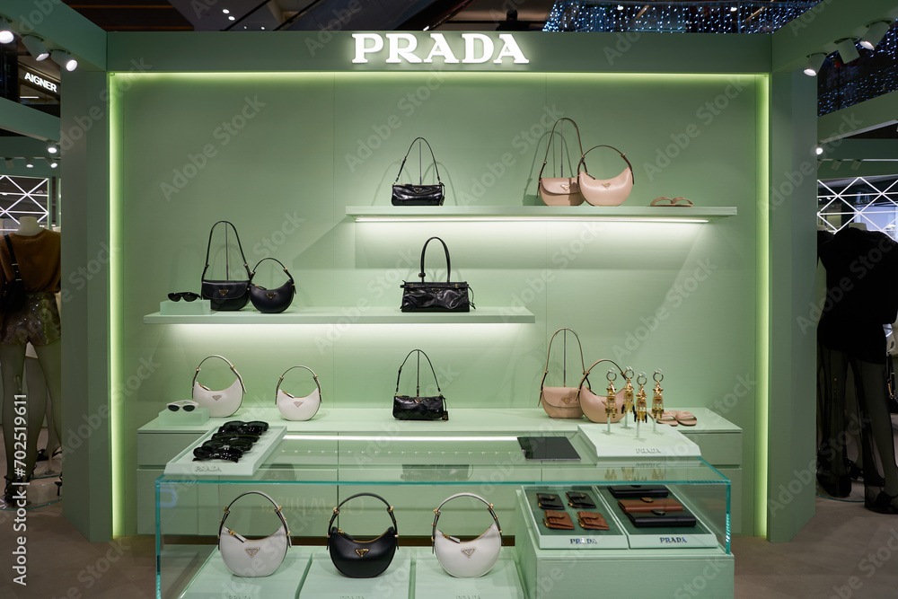 SINGAPORE - NOVEMBER 06, 2023: goods displayed inside Prada pop-up ... SINGAPORE - NOVEMBER 06, 2023: goods displayed inside Prada pop-up ...