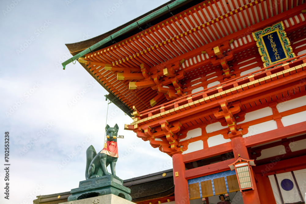 KYOTO, JAPAN - NOVEMBER 16, 2023: Kitsune, a fox statue, at the main ...