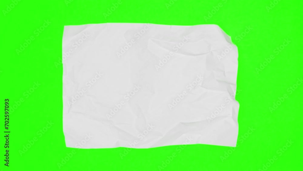 Blank sheet of white paper appears on green screen chroma key ...