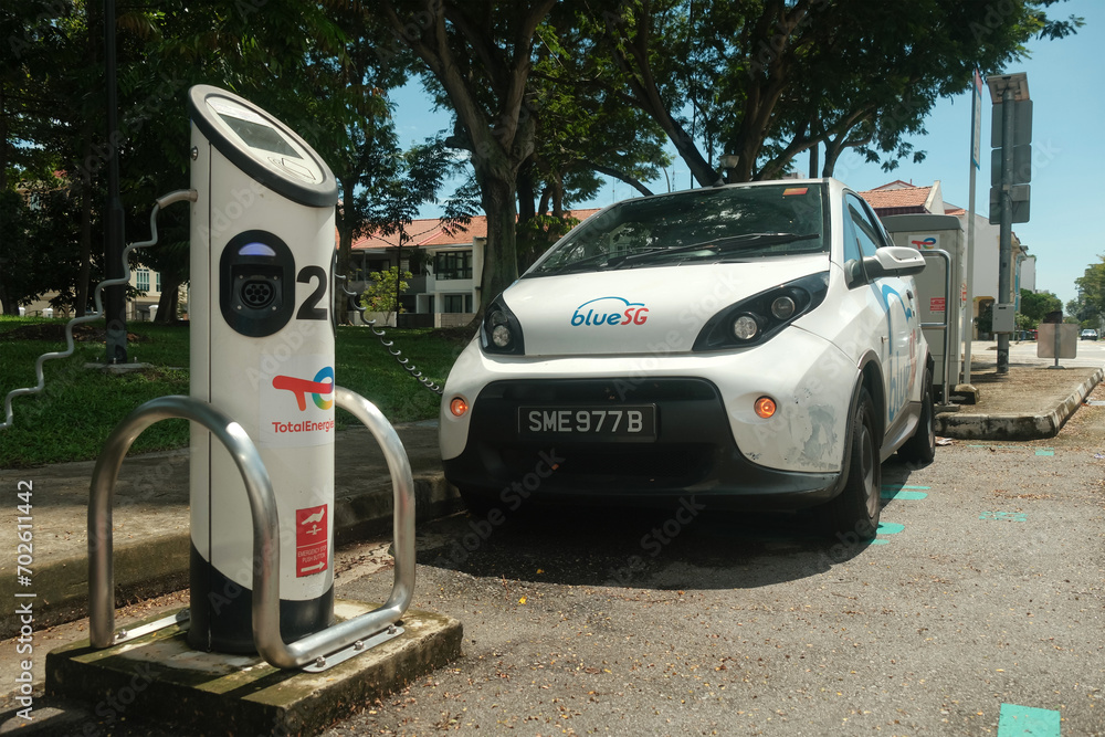 Singapore - Jan 2024: BlueSG electric vehicle parked at the roadside ...