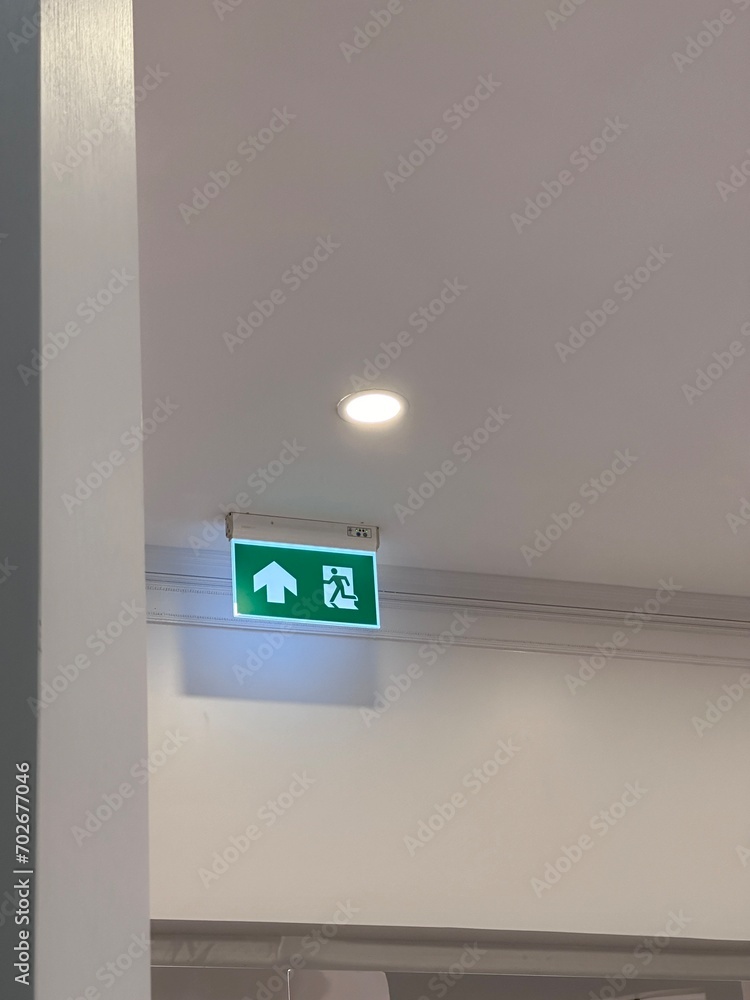 Fire exit sign in factory,Fire exit signs indicate a safe emergency ...