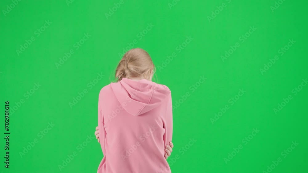 Portrait of victim on chroma key green screen background. Young girl ...