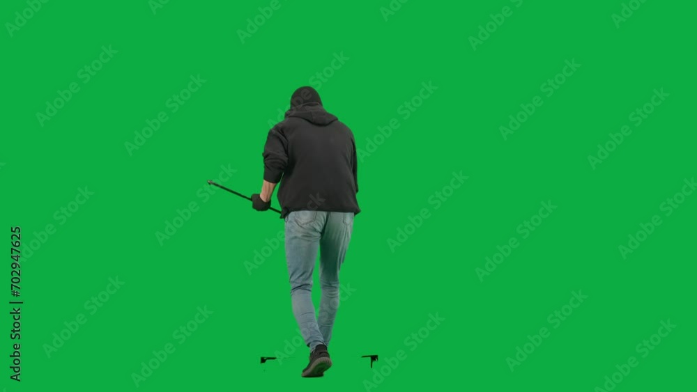 Portrait of thief on chroma key green screen background. Man robber in ...