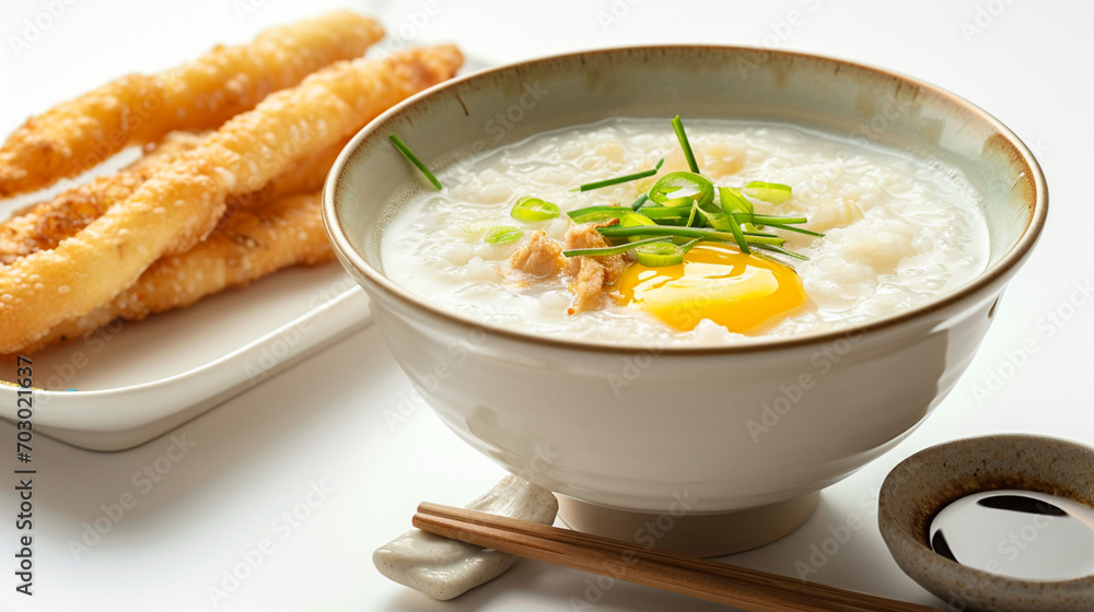 Front view fresh congee rice porridge with boil egg and pork ball and ...