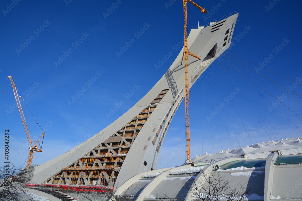 Under repair the Montreal Olympic Stadium tower. It's the tallest ...