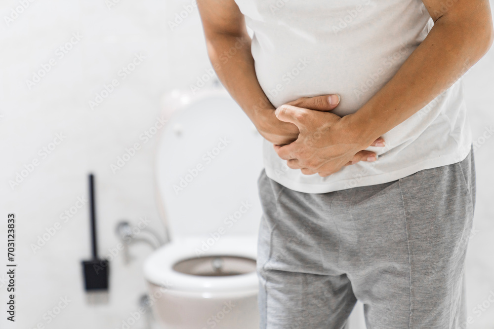 Men have stomachache and use their hands to hold their stomach In the ...