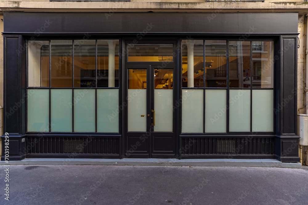 typical french boutique facade, parisian black painted storefront ...