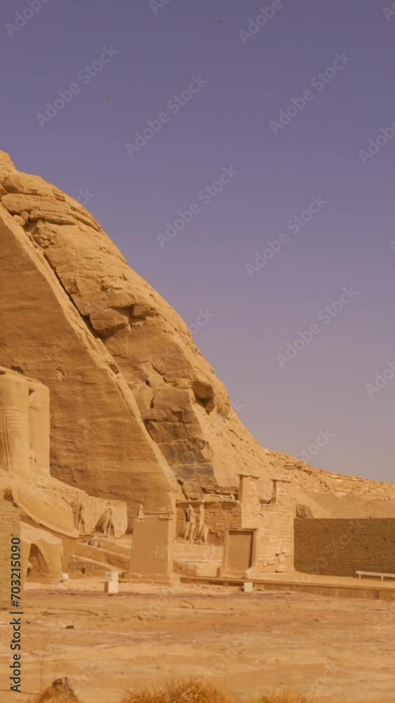 The pharaohs of the temple of Abu Simbel carved into the mountain and ...