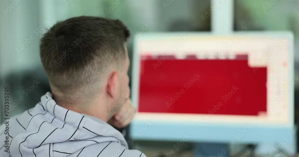 Designer studies 3D model of details on computer monitor in office ...