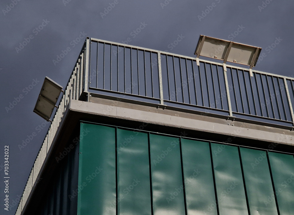 cladding of roof and perimeter with sheet metal, protects against ...