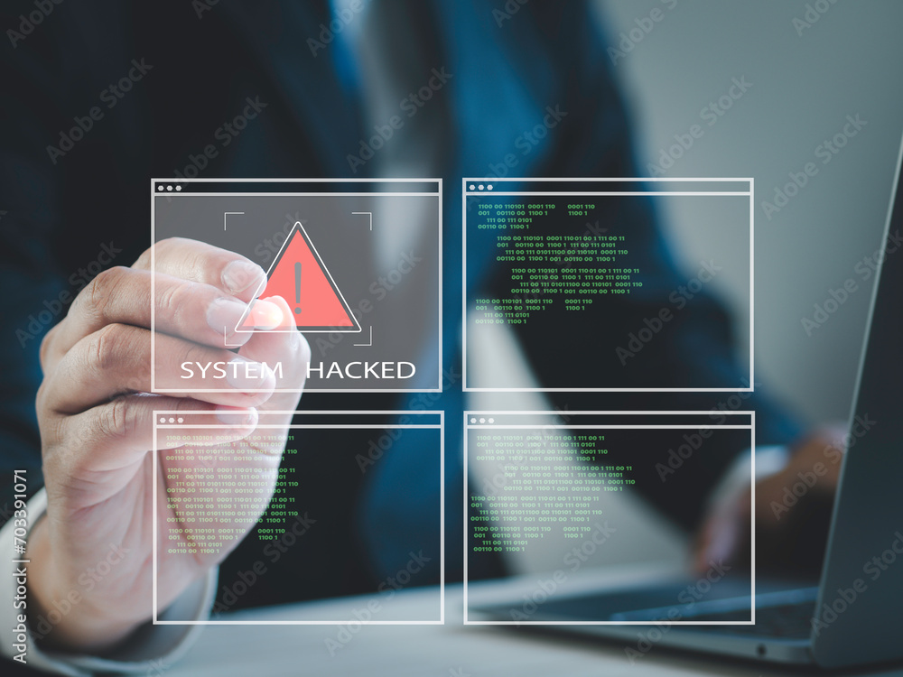 Businessman checks data after cyber attack on computer network A user ...