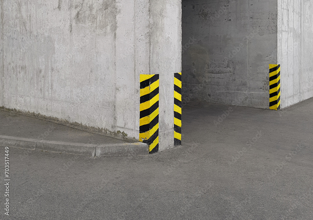 black and yellow restriction sign on the corner of an industrial ...