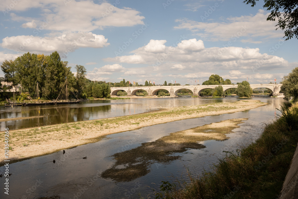 Pont Wilson bridge over diminished river Loire in rural France city ...