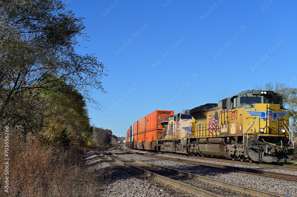 With its train strung out behind them, two locomotives lead a Union ...