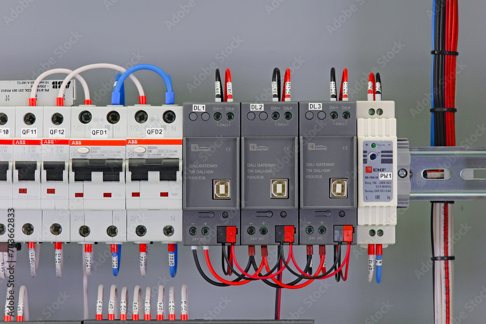 Electronic control modules for apartment automation are installed in an ...