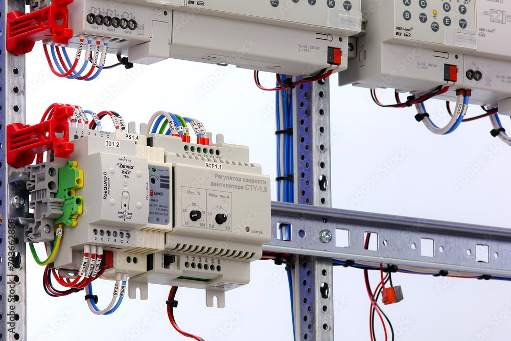 Electronic control modules for apartment automation are installed in an ...