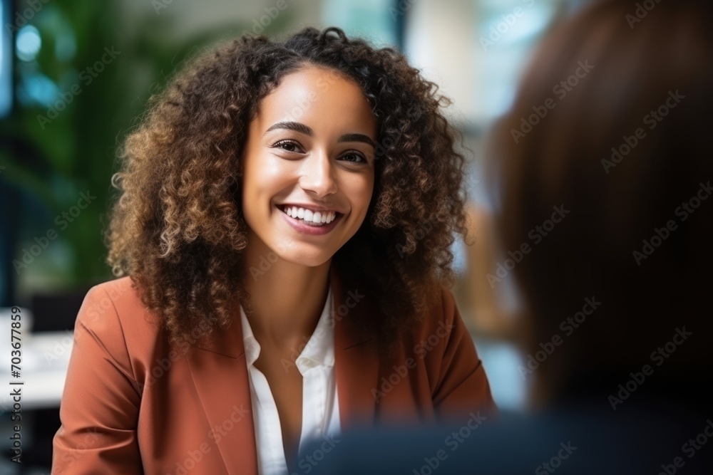 Smiling female job candidate in an office interview, hiring image for ...