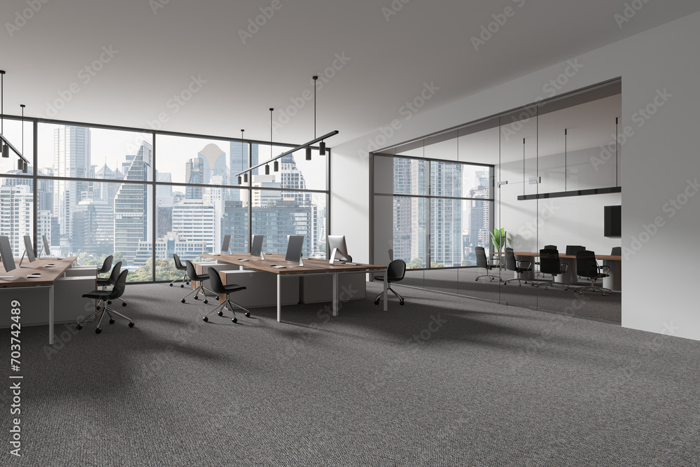 Corner view of office interior with coworking and meeting room ...