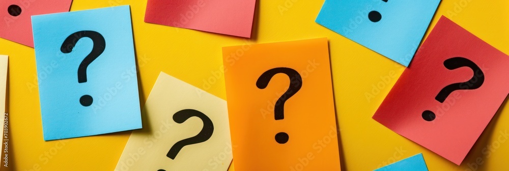 Colorful post-it notes with question marks on a vivid yellow background ...