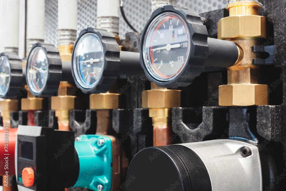 Pressure, temperature and flow sensors in an industrial boiler room ...